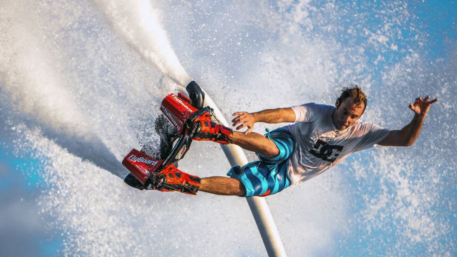 Experience the thrill of flyboarding, where water jets propel you into ...